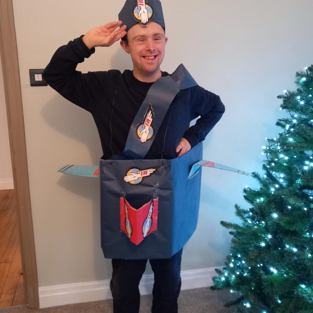 Mark designs costume for Christmas party | Thera Trust